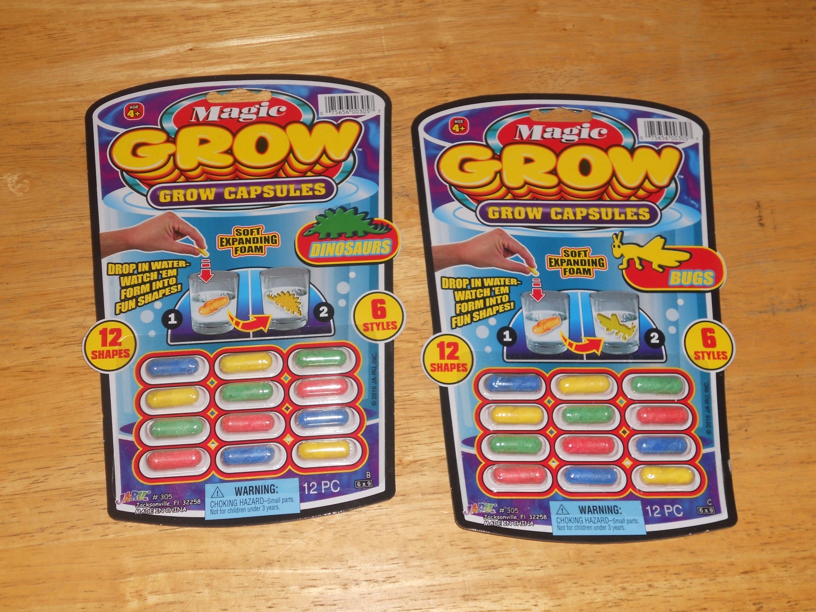 LOT OF 2 Magic Grow Capsules 1 BUGS + 1 DINOSAURS w/ILLUSTRATION & NAME ...