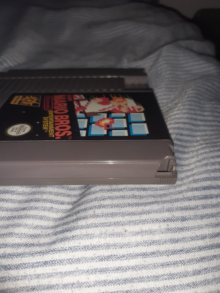 super mario 1 and 2 cheap. Tested and working. Please read before buy ...