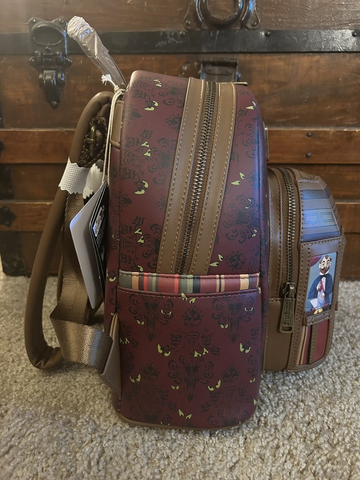 Disney Haunted Mansion Stretching Room Portraits Glow Mini Backpack ...