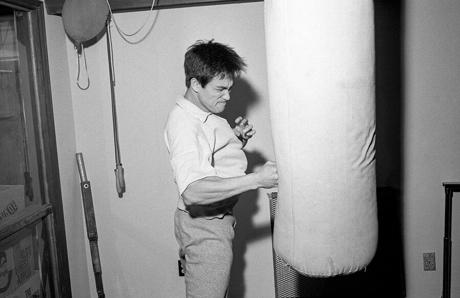 Bruce Lee Punching Forearm Tattoo