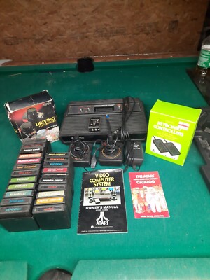ATARI 2600 Console with 22 Games 2 Joysticks 2 Paddles Driving controller | eBay