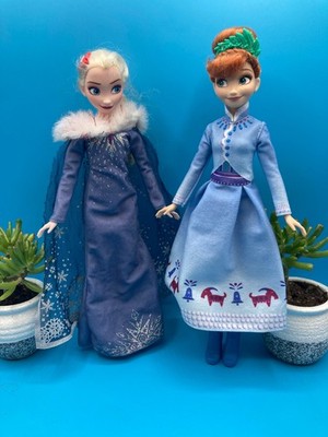 Disney Olaf’s Frozen Adventure Elsa & Anna dolls in holiday dress ...