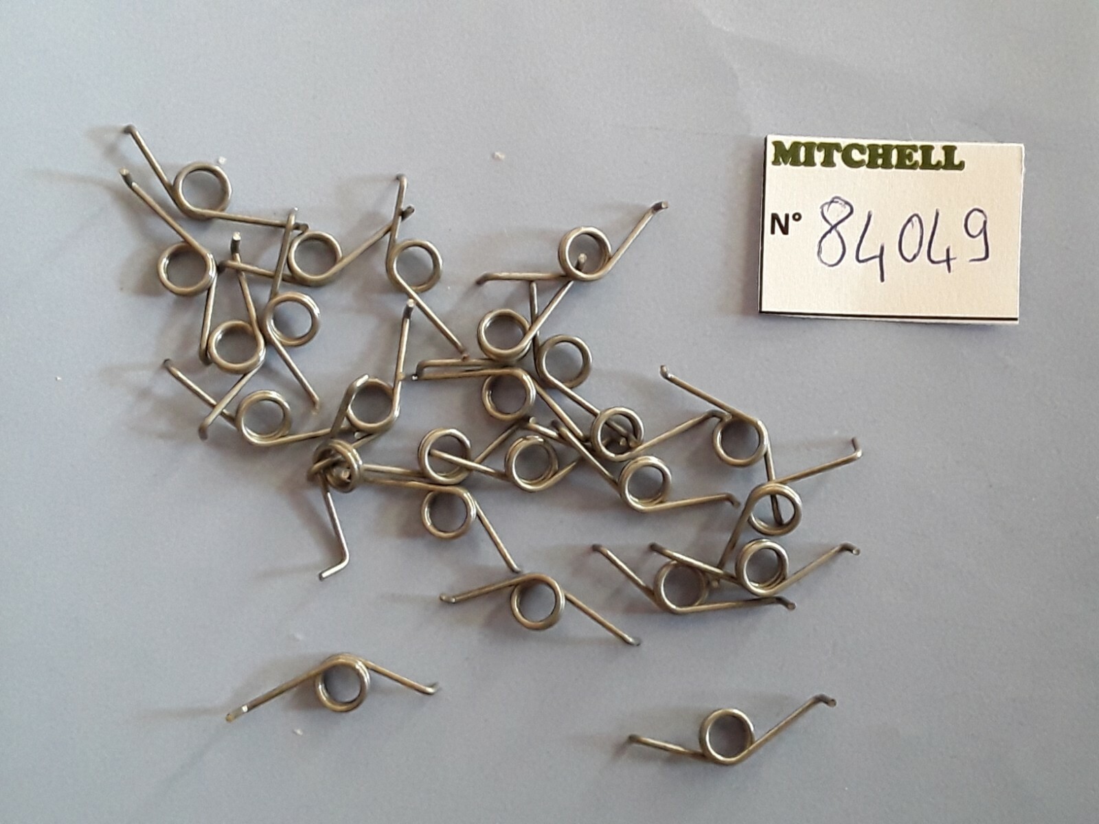 25 Pickup Spring 1160RD & Various Mitchell Reel Part 84049 Bail Spring ...