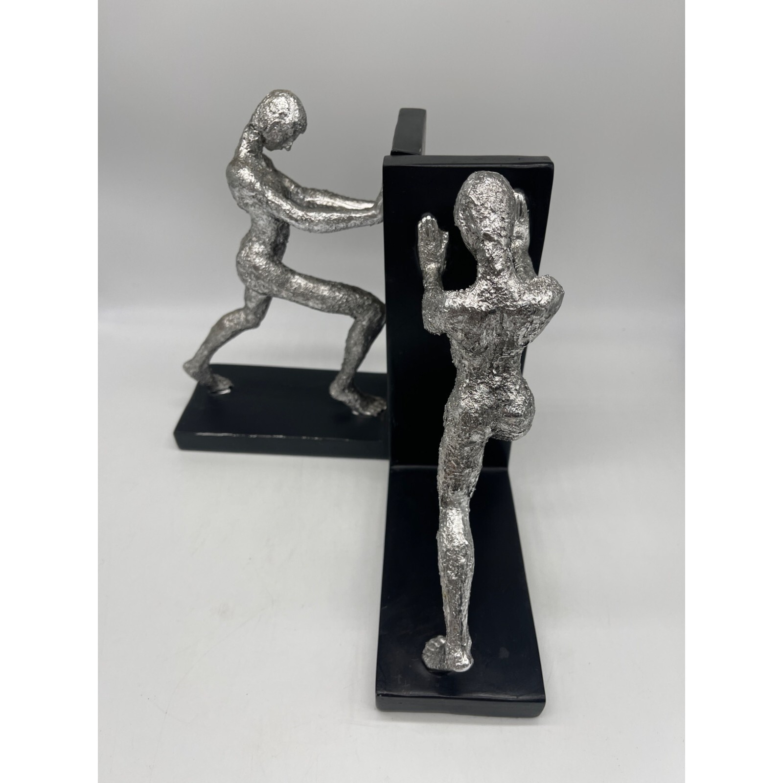 Metal Sliver Men Pushing Sculpture Balck / Silver Bookends | eBay
