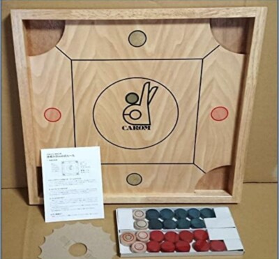 A mini slim carrom board with the Japan Carrom Association logo (with ...