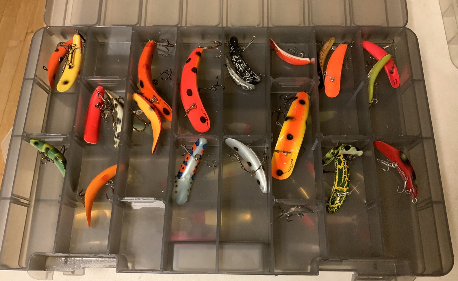 Plano Tackle Box Full Of Flatfish Fishing Lures And Other Metal Spoons ...