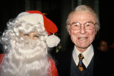 Angie Dickinson wearing a Santa Claus costume American radio telev- Old ...