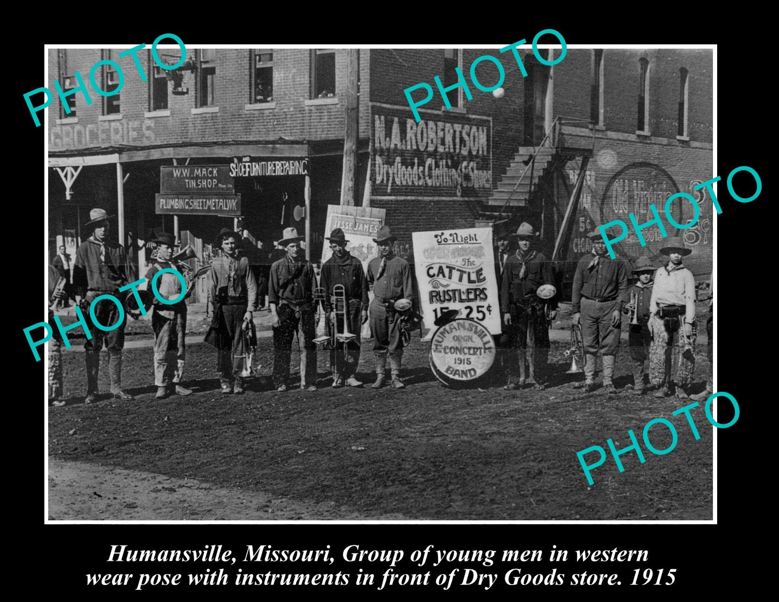 OLD POSTCARD SIZE PHOTO OF HUMANSVILLE MISSOURI TOWNBAND IN FRONT OF ...