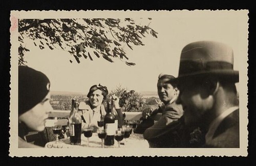 Martha Dodd and Gestapo chief Rudolf Diels drinking wine at outdoor ...