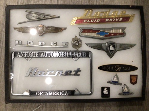 Antique car radiator emblems and Antique Automobile Club license plate ...