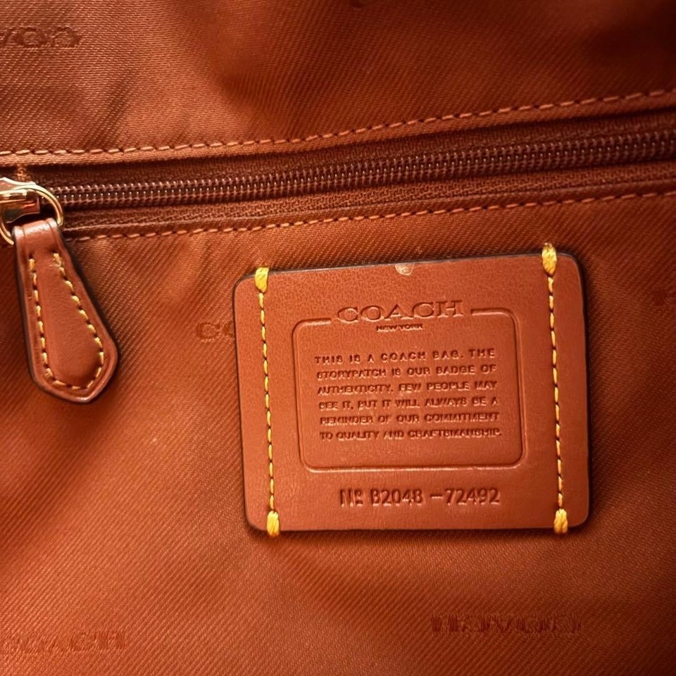 Borsa a tracolla Coach Meadow Prairie in pelle lucida con ciottoli ...