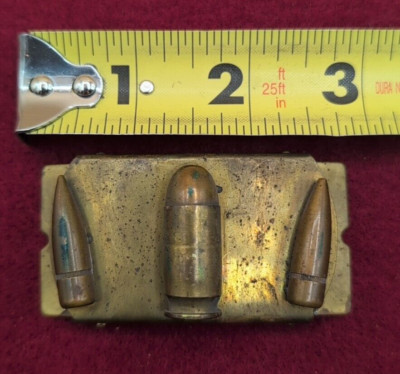 WWII/2 US GI brass buckle with .45 round RA 42 dated & marked w/two .30 ...