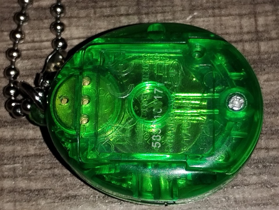 Genuine Tamagotchi Mini Bandai Virtual Pet Game Translucent Green ...
