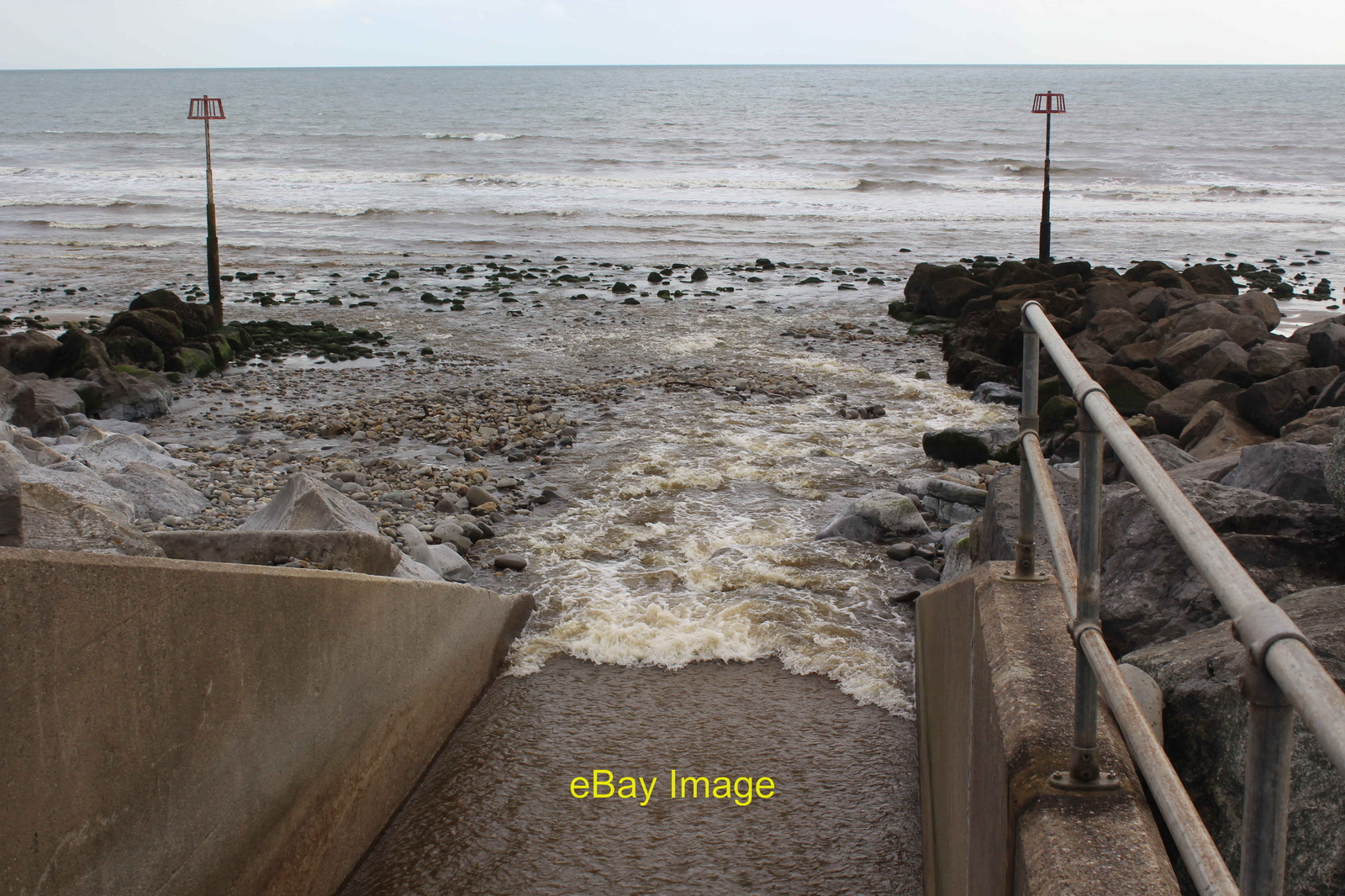 Photo 12x8 Stream outfall at Amroth village Water emerging from culvert ...