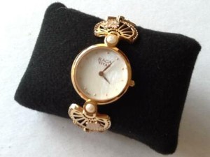 Pre-owned: Raga Titan Ladies Watch. Gold. Mother of pearl dial. 2567WAA ...