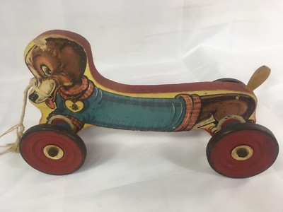 THE GONG BELL MFG. CO. EAST HAMPTON CONN. DUTCHIE DOG # 230 PULL TOY ...