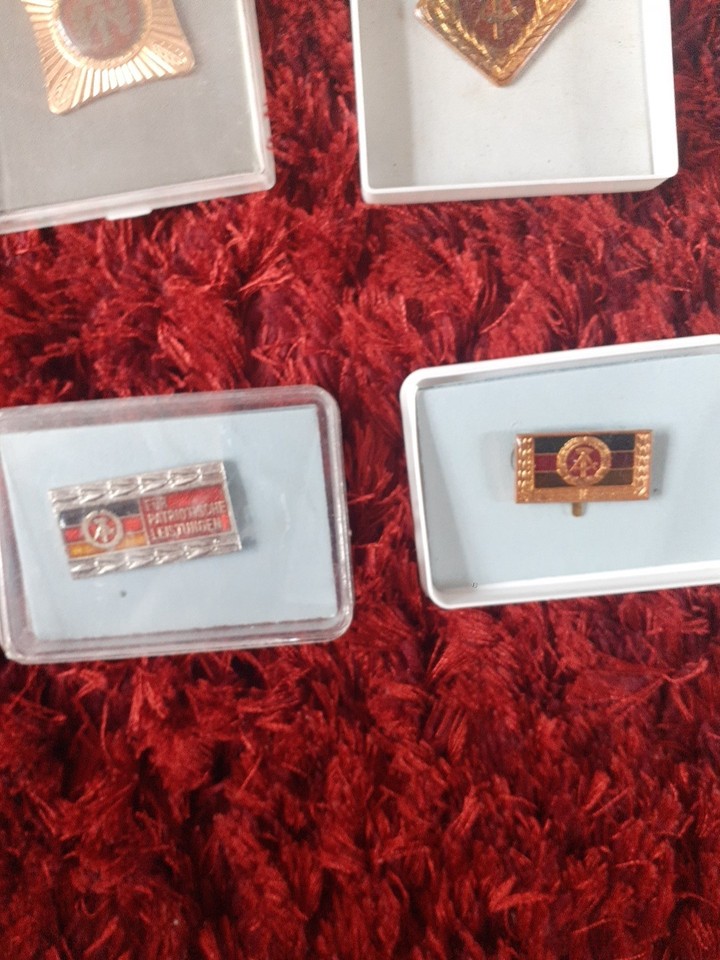 Sixteen Post War German Medals Plus Two Military Cap Badges Etcetera ...