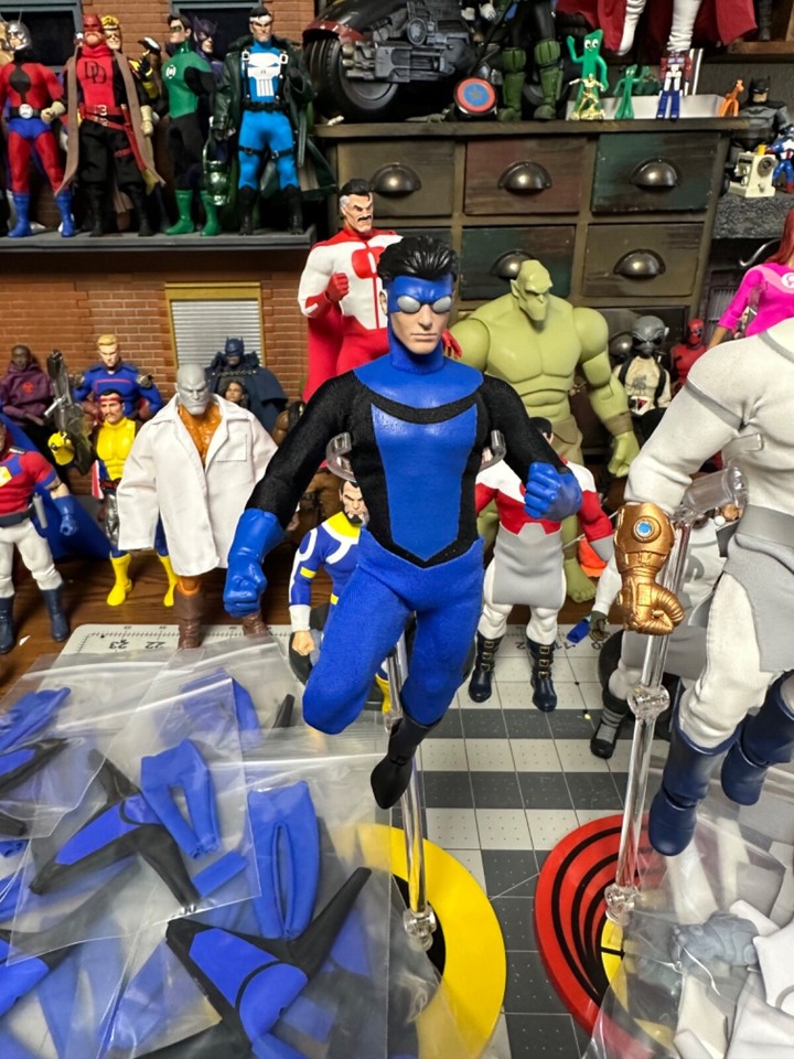 One 12 mezco conquest and invincible suits | eBay