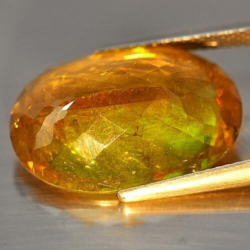 Intense Green Titanium Sphene Red Spark 15.89 Ct. Oval 19.7 x 13.4 Mm ...