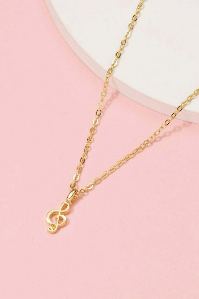 Gold Colored Trebel Clef Necklace | eBay