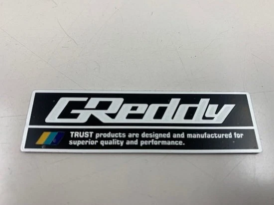 Trust Logo Greddy