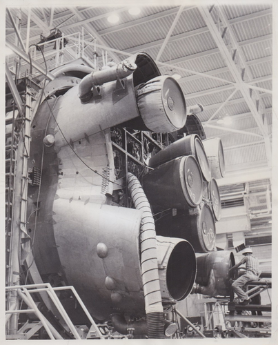 1961 Press Photo NASA Technician works on Saturn Rocket Booster at ...
