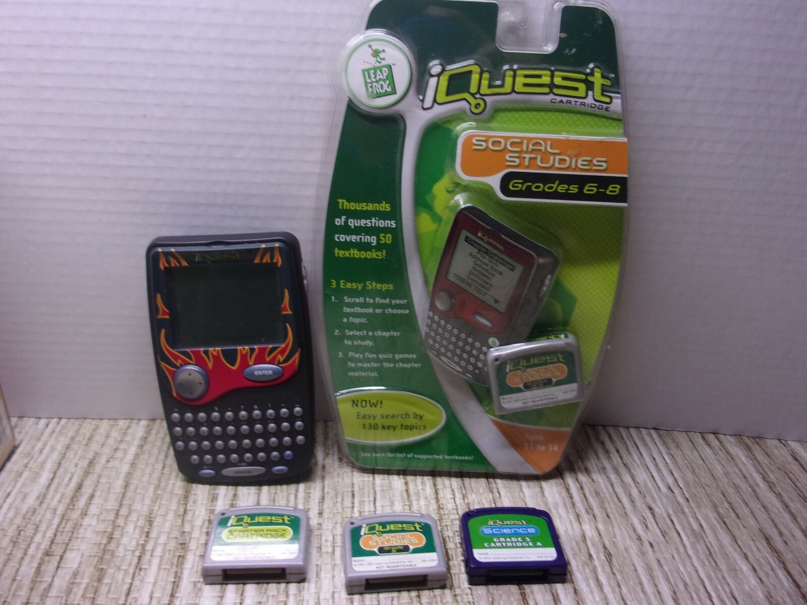 LeapFrog IQuest Handheld Electronic Game With 4 Cartridge 1 is New and ...