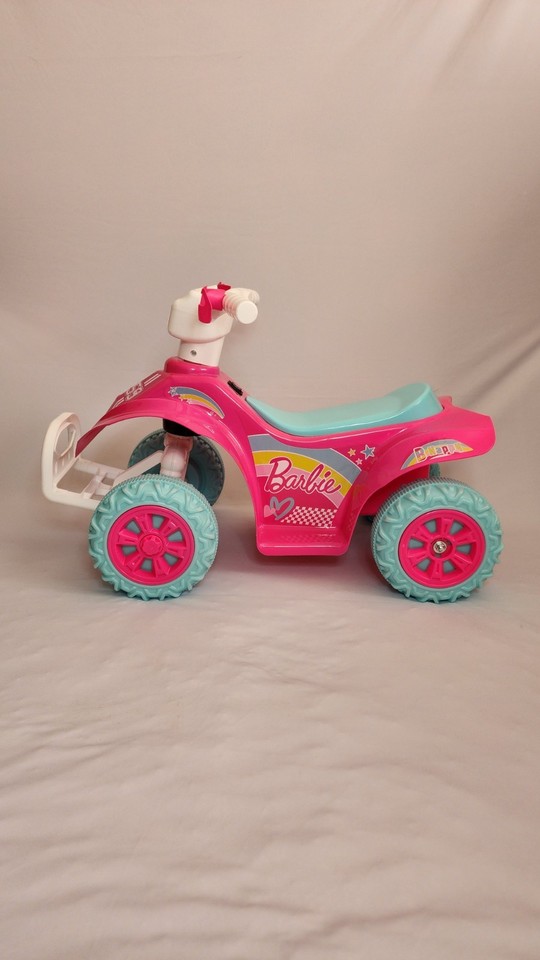 Barbie 6V ATV Ride On Toy by Mattel is a pink vehicle designed for kids ...