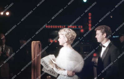 35m-16501 Russ Tamblyn & date attend film premiere James Dean Giant 35m ...