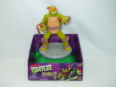 TMNT Ninja Turtle spin and spray water sprinkler toy - Nickelodeon ...