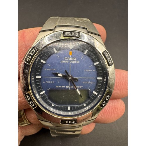 Casio Wave Ceptor Watch Men Silver Tone Blue Dial 2735 WVA-105H 50M ...