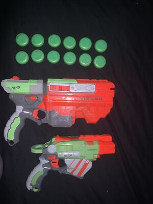 Two Nerf Disc Guns (12 Disc Projectiles Included) | eBay