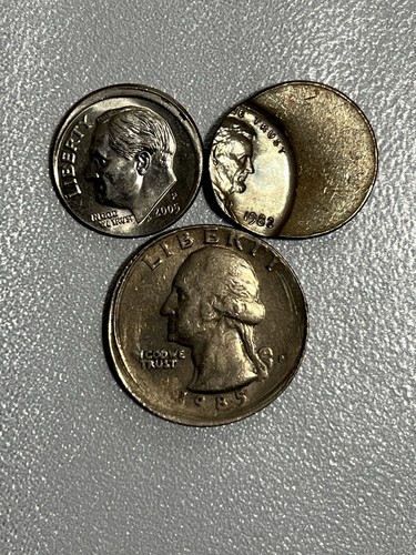 Off Center Coins With Dates: 1985P Quarter, 2005P Dime, 1982P Penny ...