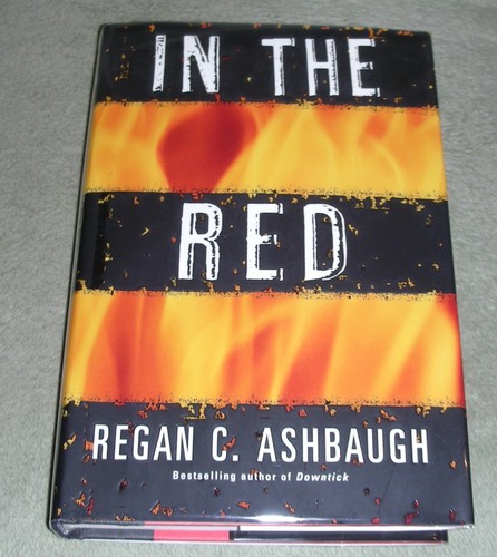 IN THE RED by Regan C. Ashbaugh ~ 1999 HC/DJ~ 1st Edition 1st Printing ...