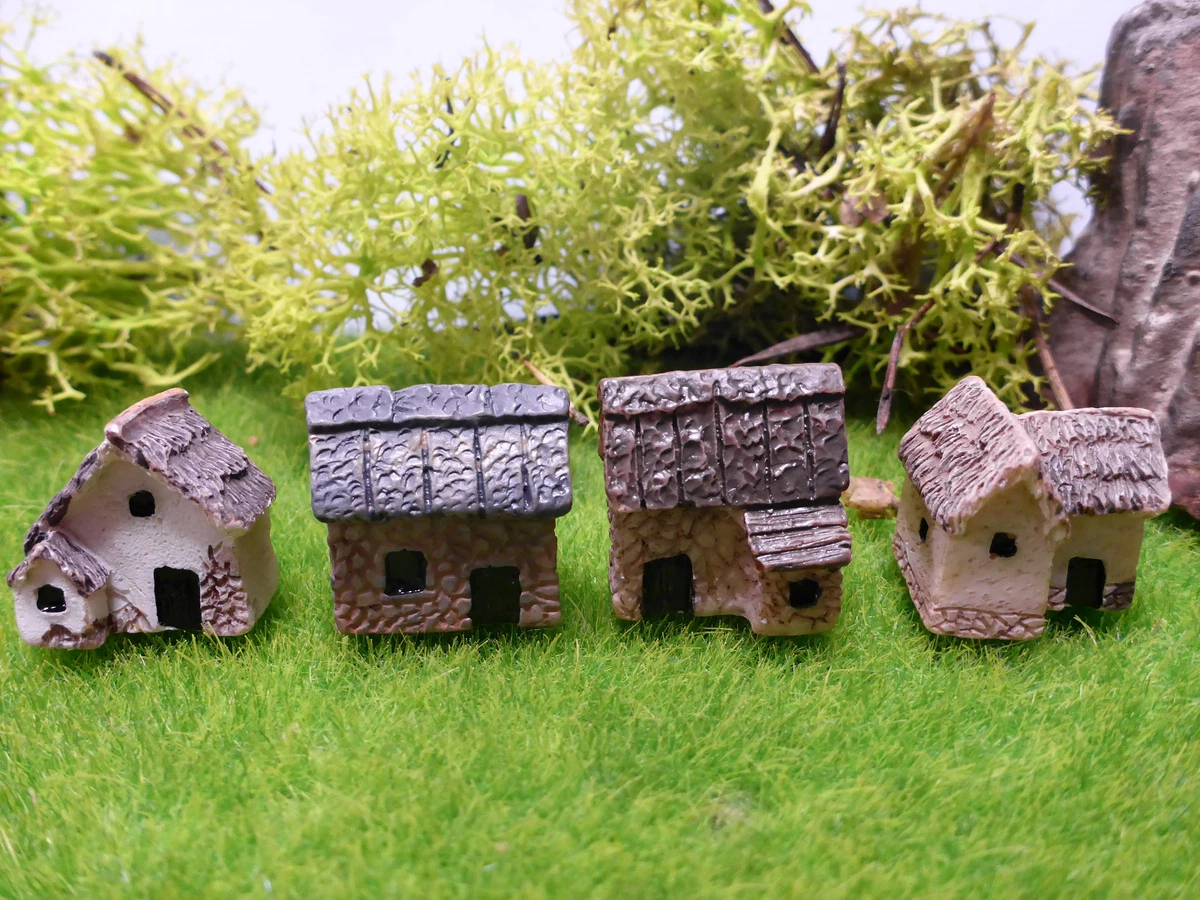 Miniature Fairy Cottages In Terrariums