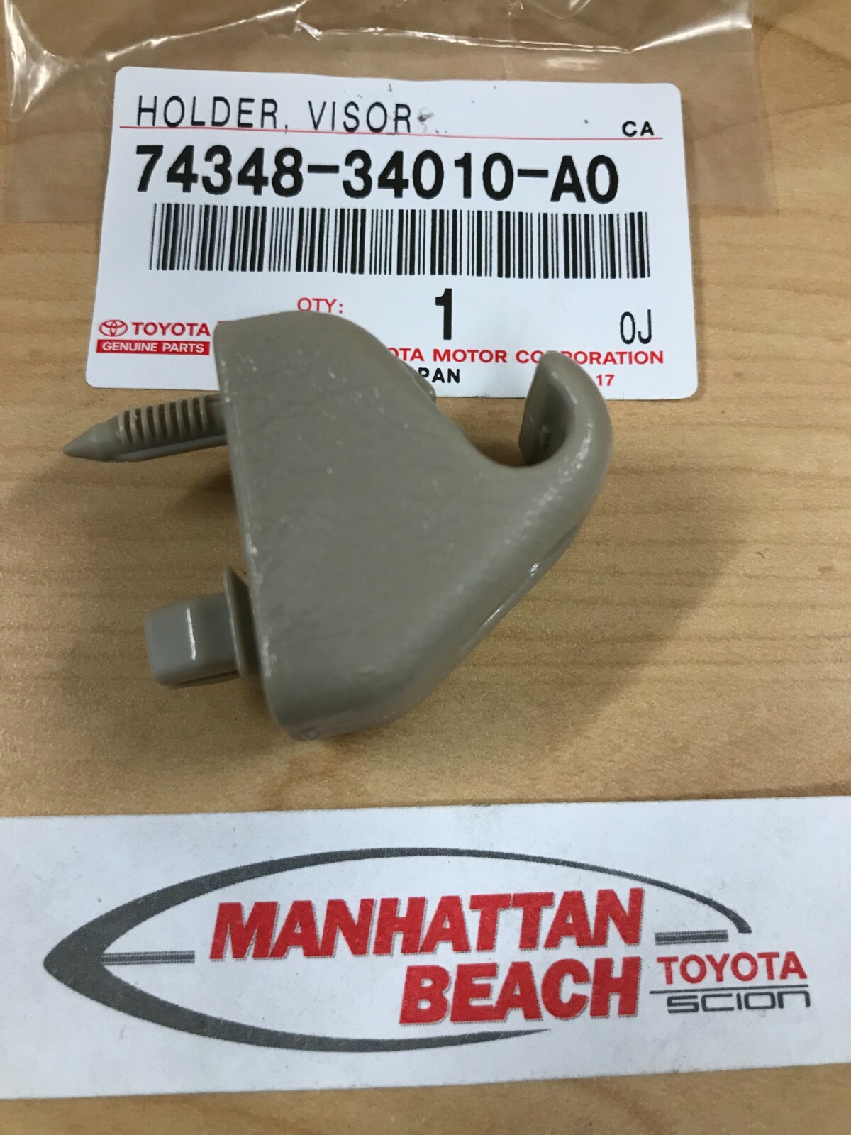 GENUINE TOYOTA 00-06 TUNDRA IVORY SUN VISOR HOLDER 74348-34010-A0 NEW ...