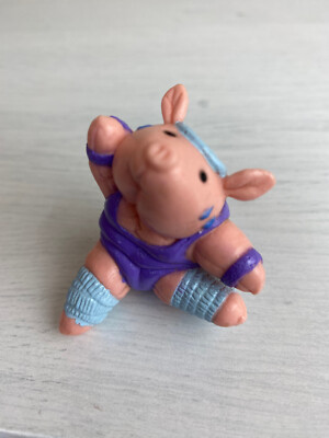 Piggy wigs (1990, Merit), "Pignastics" aerobics/ gymnastics pig figure ...