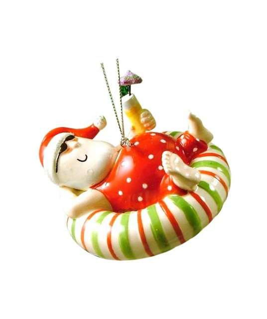 Christmas Ornament Santa Relaxing on an Inner Tube Float With a ...
