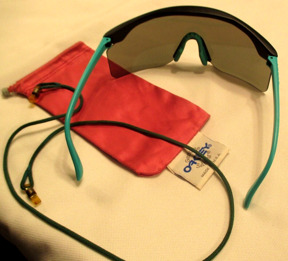 OAKLEY RAZOR BLADES SUNGLASSES TEAL EAR STEMS & NOSE PC DARK IRIDIUM ...