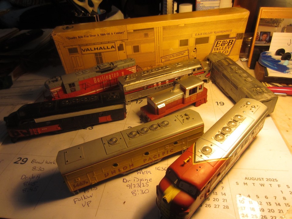 HO trains; A nice lot of 7 diesel locomotive shells--different road ...