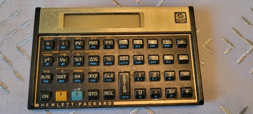 HP-12C Hewlett Packard Black/Gold Handheld Financial Calculator w ...