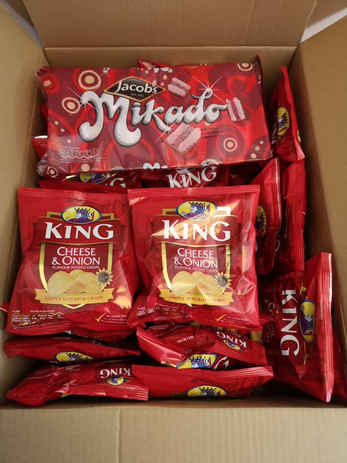 King Crisps 30X25G pack box also a packet of Mikado Biscuits biscuits ...