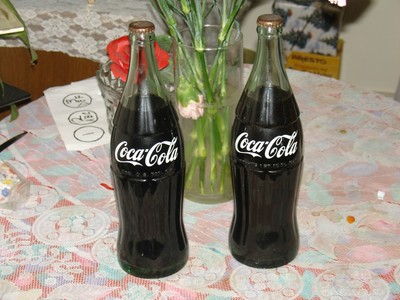 TWO BOTTLES OF COKE COLA "THE REAL THING" | eBay