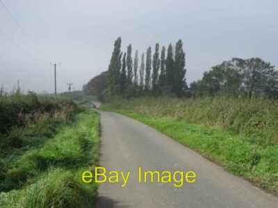Photo 6x4 The Road To Scrayingham Skirpenbeck Close to Pasture Farm ...