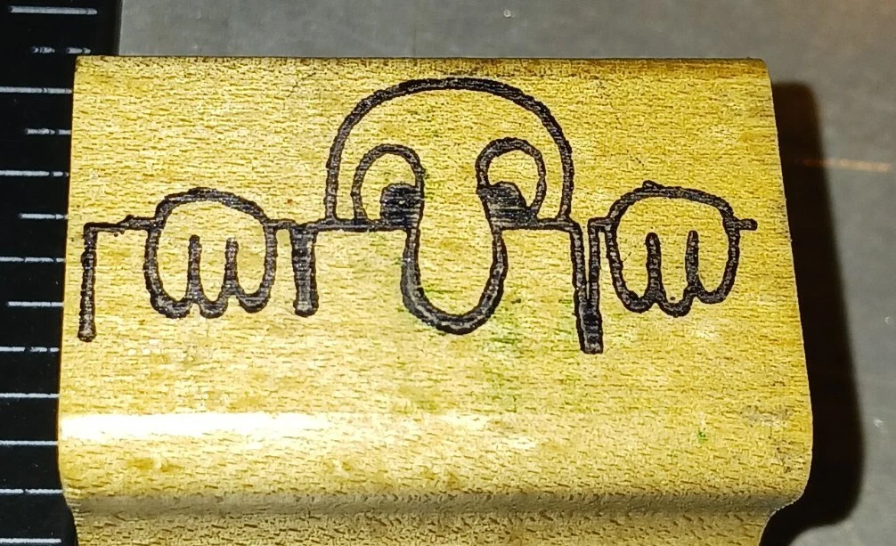 Baby Peeking Over Fence