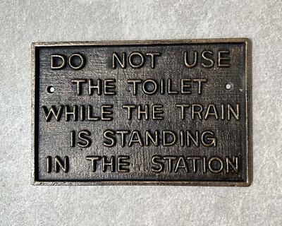 Railway Sign DO NOT USE THE TOILET WHILE THE TRAIN IS STANDING IN THE ...