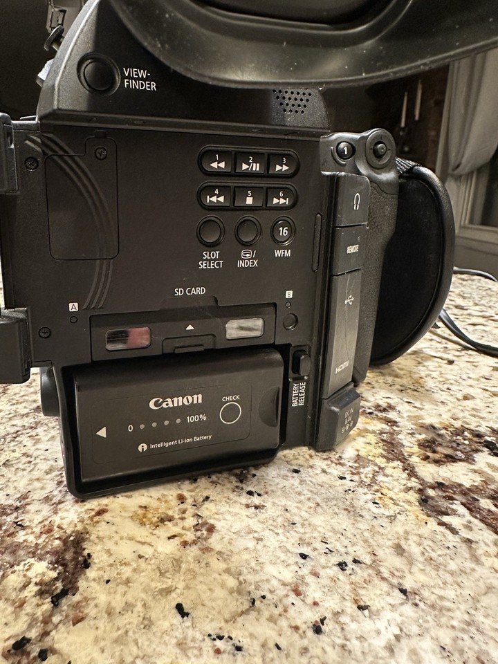 Canon EOS C100 Mark II Cinema Camera Body with Top Handle And Rode ...