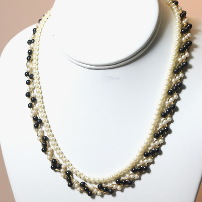 Pair of petite vintage signed Trifari black and white pearl 18 ...