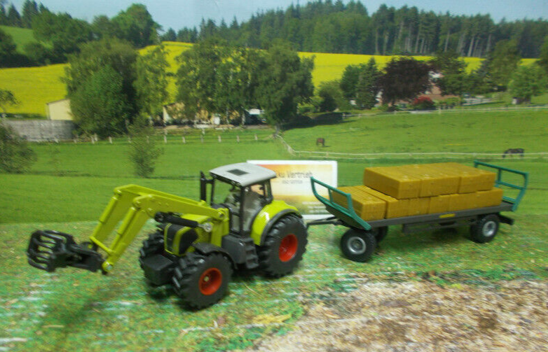 Siku Art.Nr.:1946 -Claas mit Ballengreifer und Anhängerund Strohballen ...