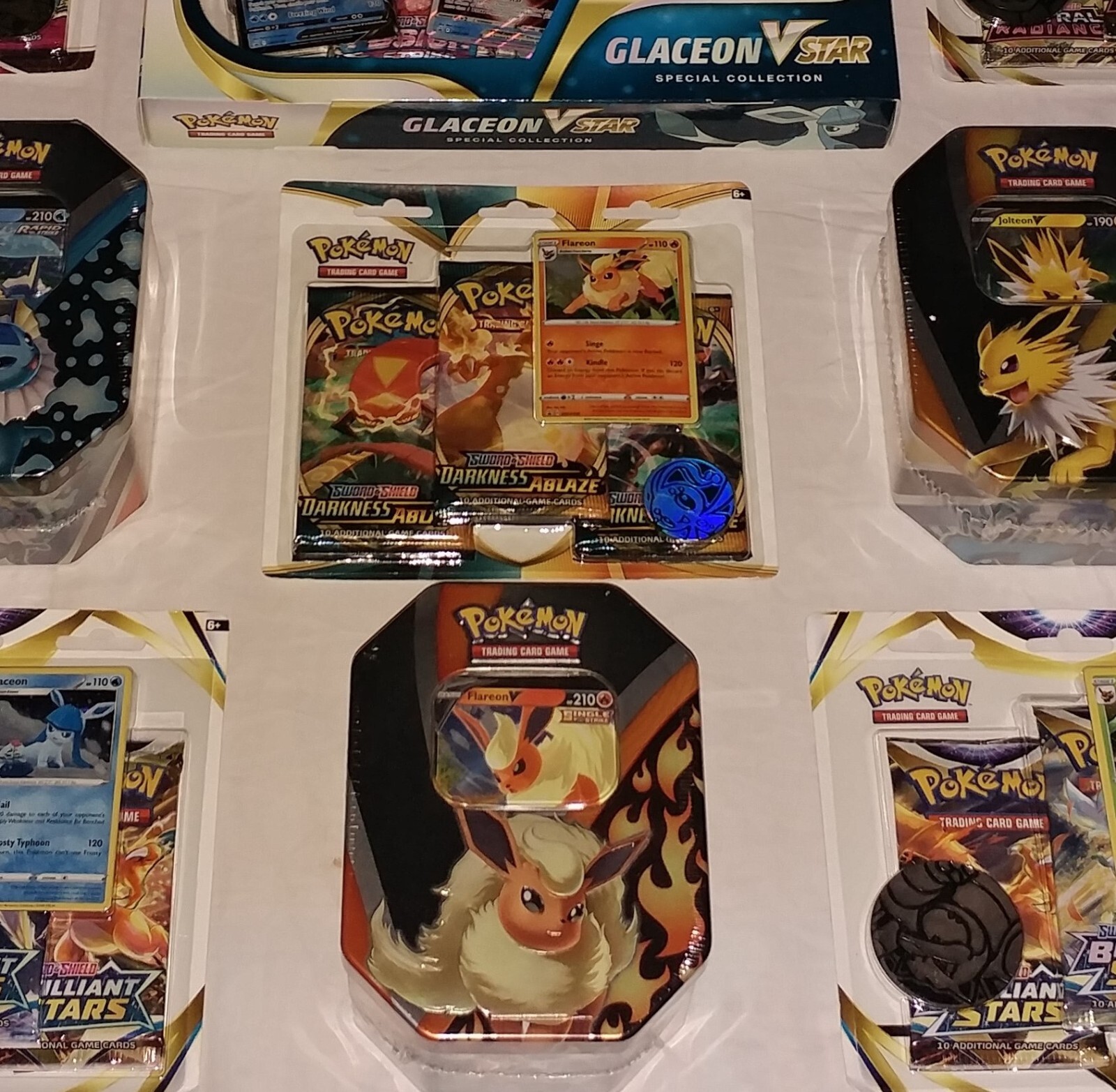 57 Pokemon Packs 🤗Tins - 3 Pack Blister Packs - 14 Evolving Skies Packs ...